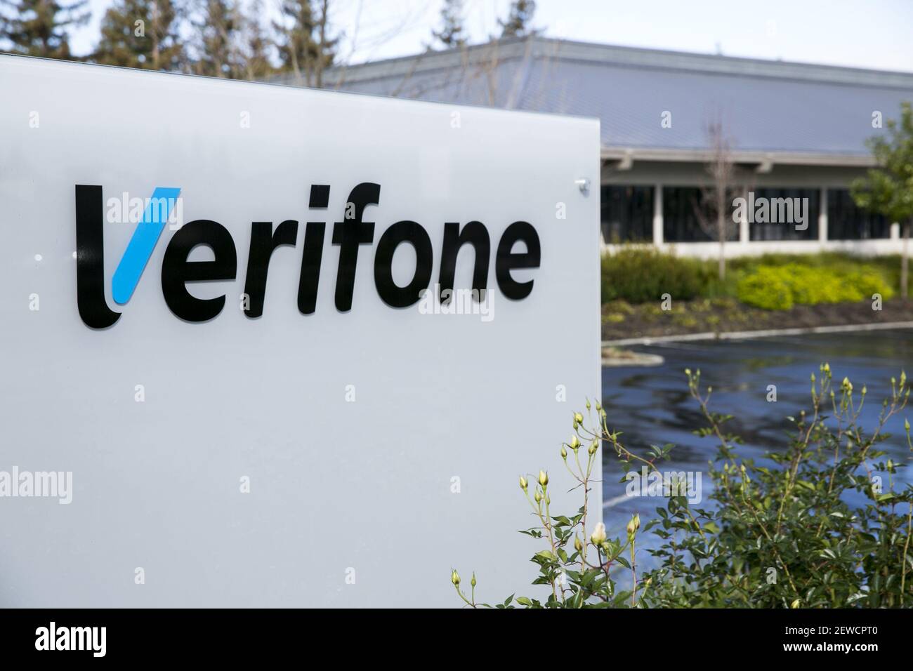 A logo sign outside of the headquarters of Verifone in San Jose ...