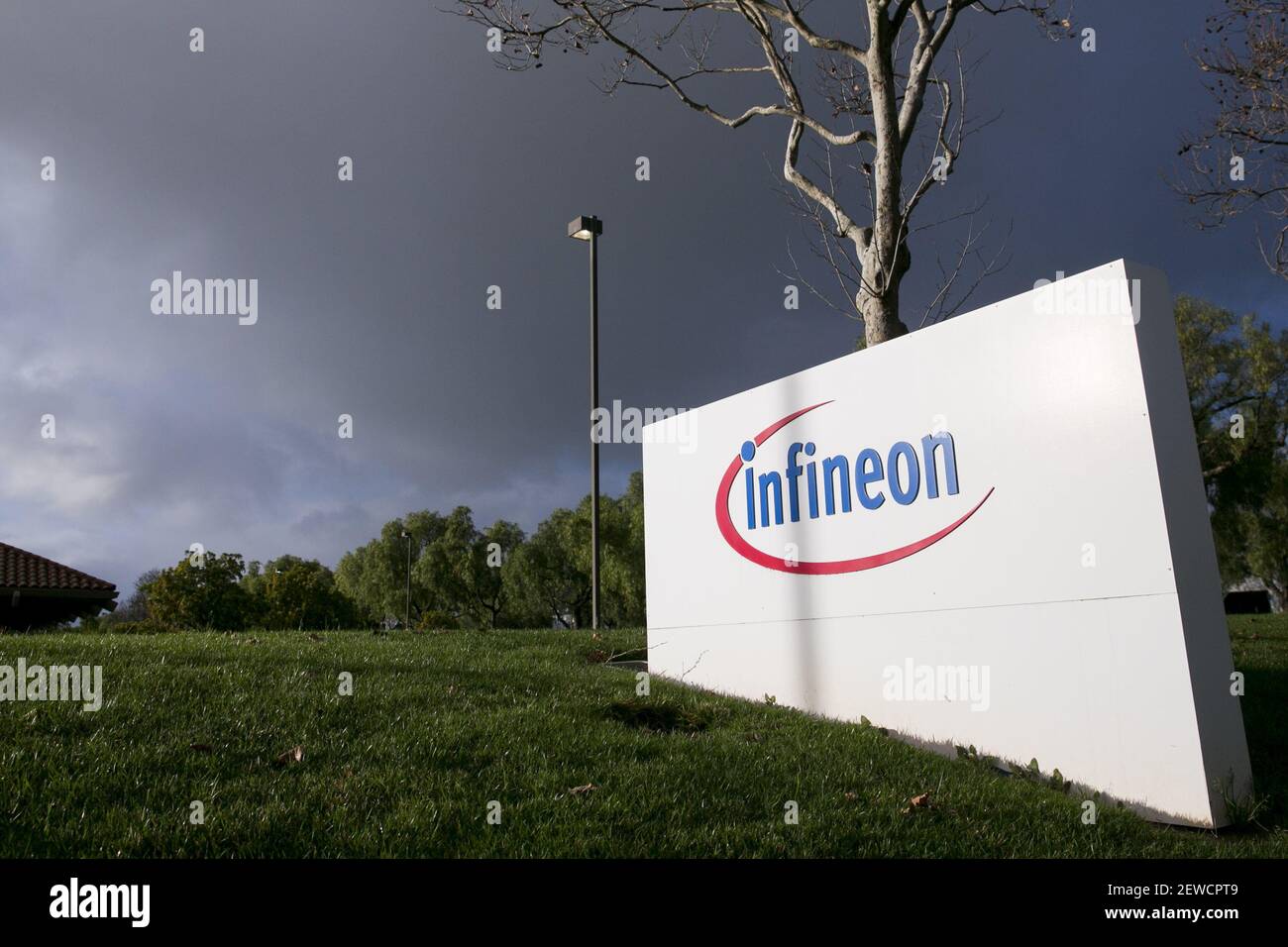 A logo sign outside of a facility occupied by Infineon Technologies in ...
