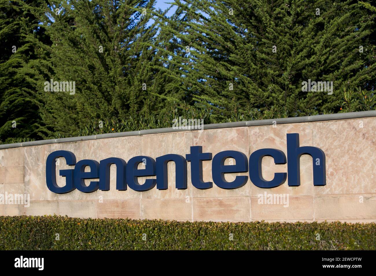 A logo sign outside of the headquarters of Genentech in South San ...
