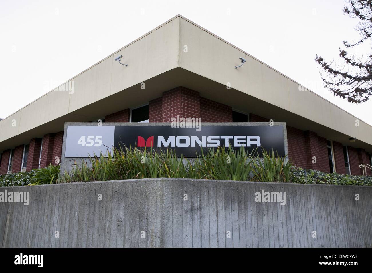 A logo sign outside of the headquarters of Monster Inc., in Brisbane ...