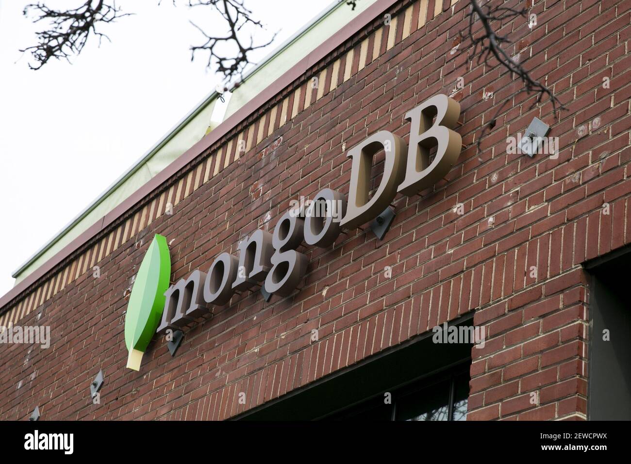 A logo sign outside of the headquarters of MongoDB in Palo Alto ...