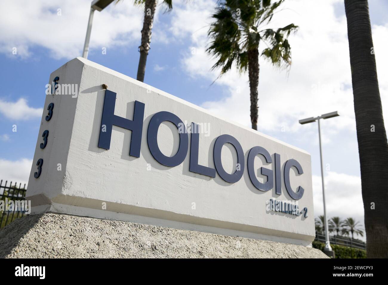 A logo sign outside of a facility occupied by the Hologic Corporation ...