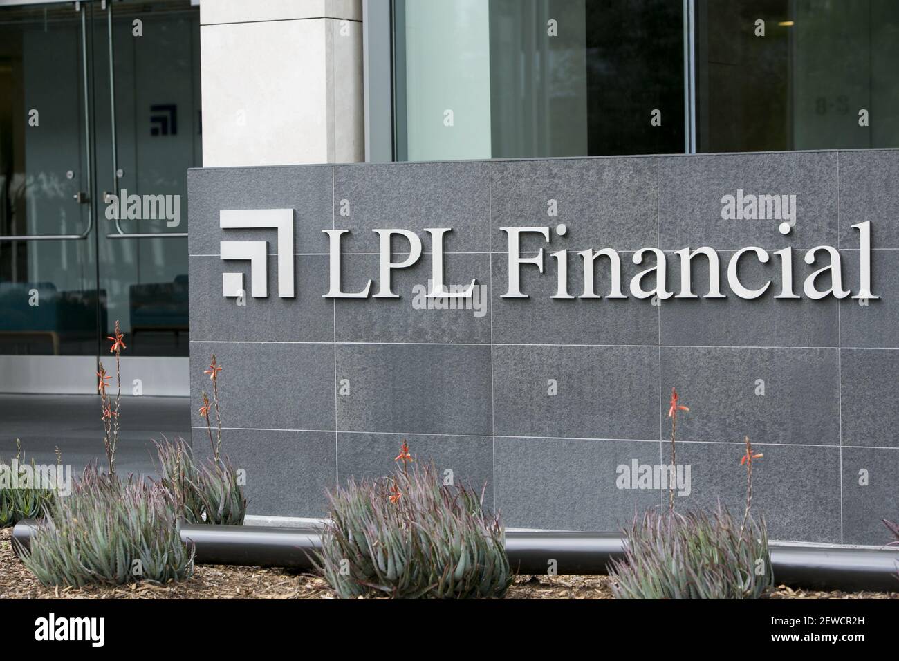 A logo sign outside of a facility occupied by LPL Financial in San ...