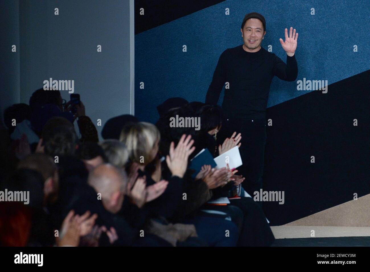 Designer Derek Lam makes an appearance on the runway at the end of his ...