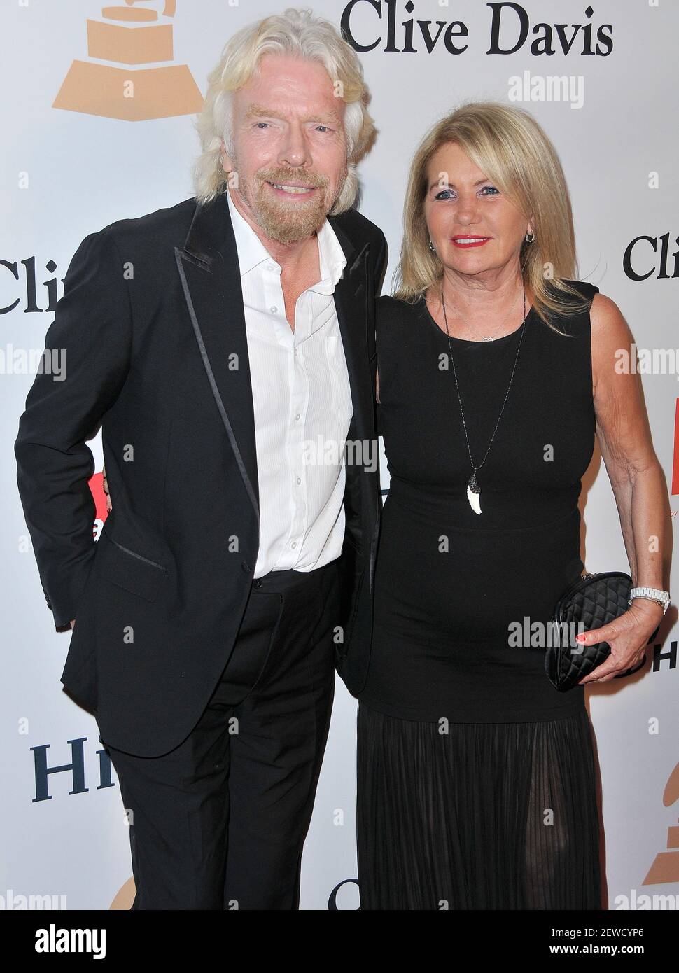(L-R) Richard Branson and Joan Templeman arrives at the 2016 Pre-GRAMMY ...