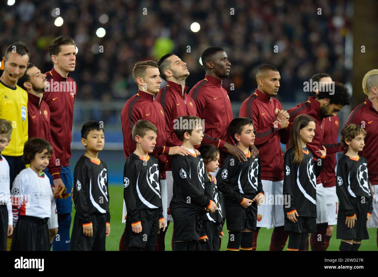 AS Roma player line up with mascots prior to kick off during the ...