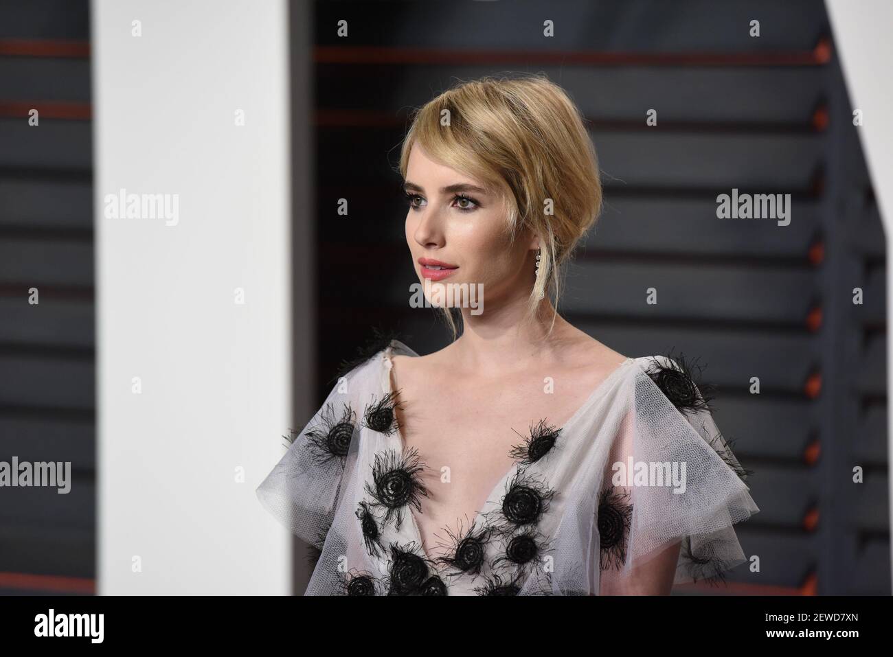 Emma Roberts arriving at the 2016 Vanity Fair Oscar Party hosted by ...