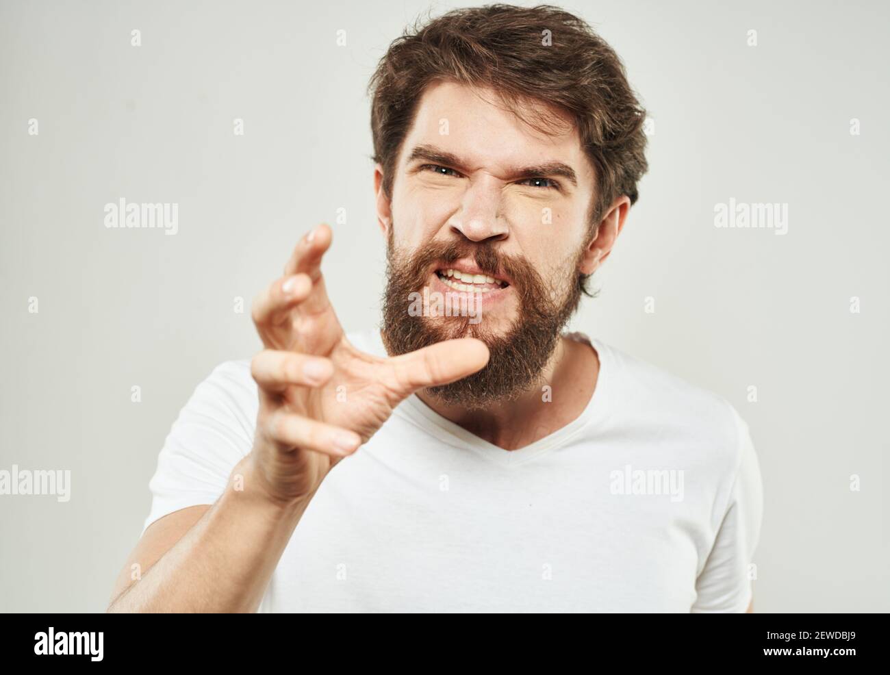 aggressive men outrage stress cry bushy beard Stock Photo - Alamy