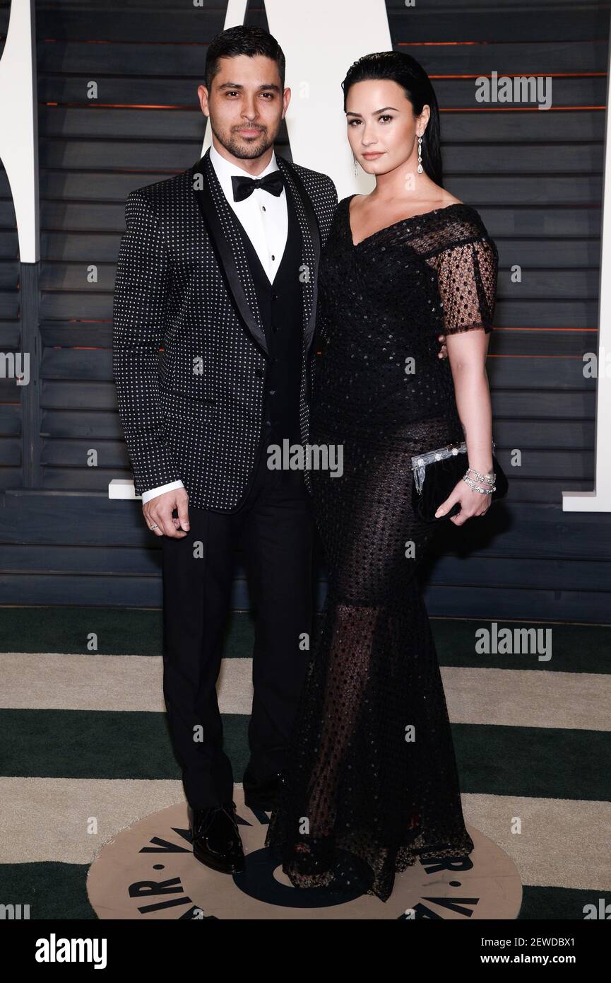 Wilmer Valderrama and Demi Lovato arriving at the 2016 Vanity Fair ...
