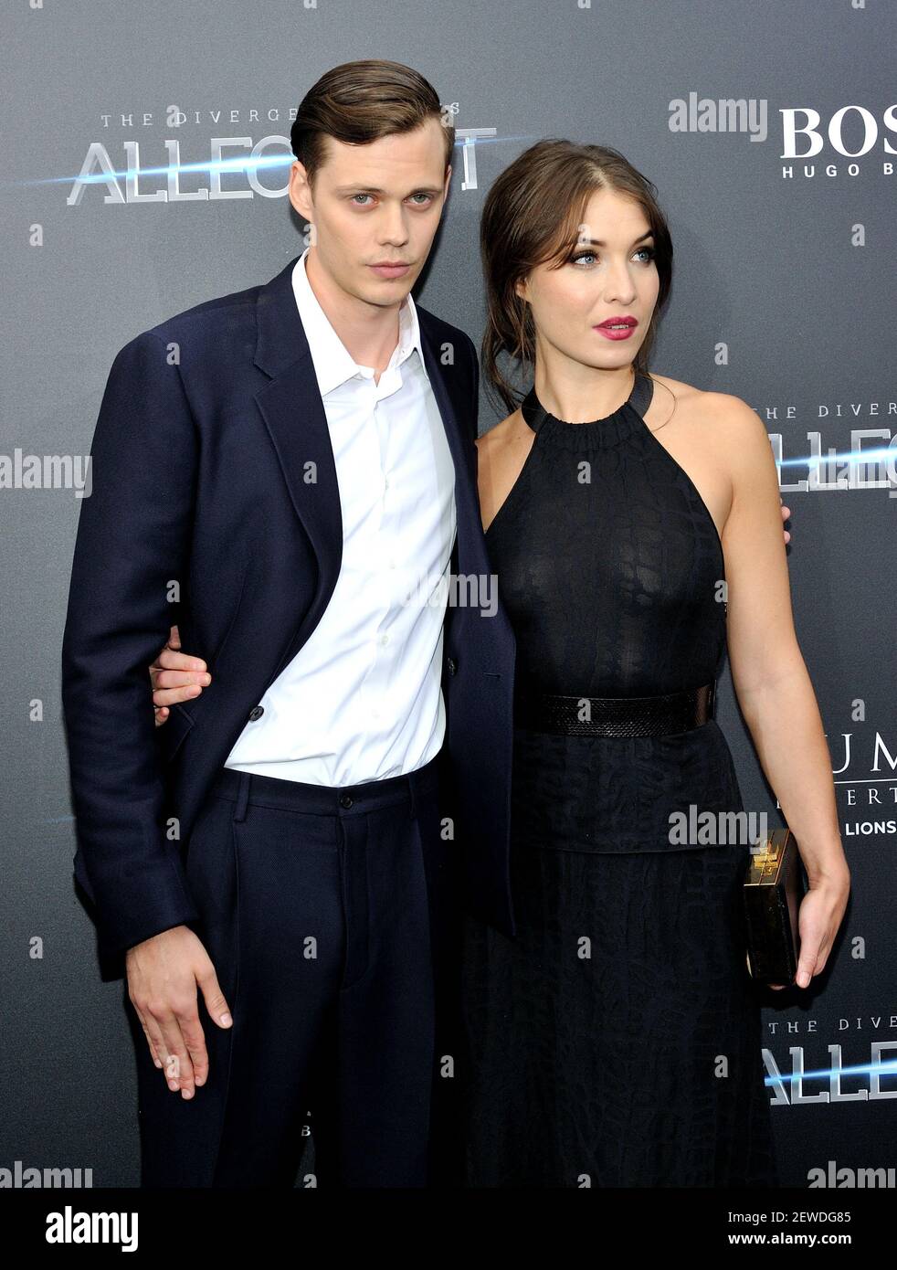 Actor Bill Skarsgård (L) attends the world premiere of "the Divergent ...