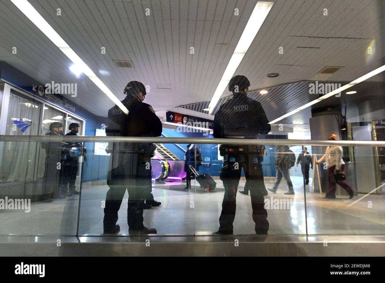NYPD Counter-Terrorism Unit Officers stands guard inside New York Penn ...