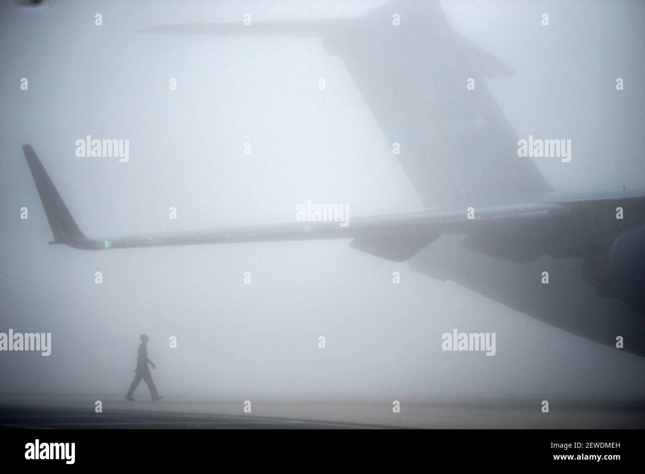 Airman 1st Class Anthony Mahon, of the 436th Airlift Wing, performs a ...
