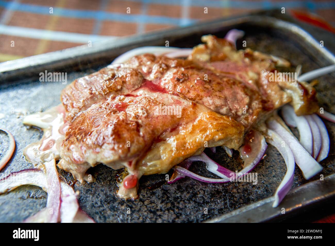A tempting Medium well rib-eye steak Stock Photo - Alamy
