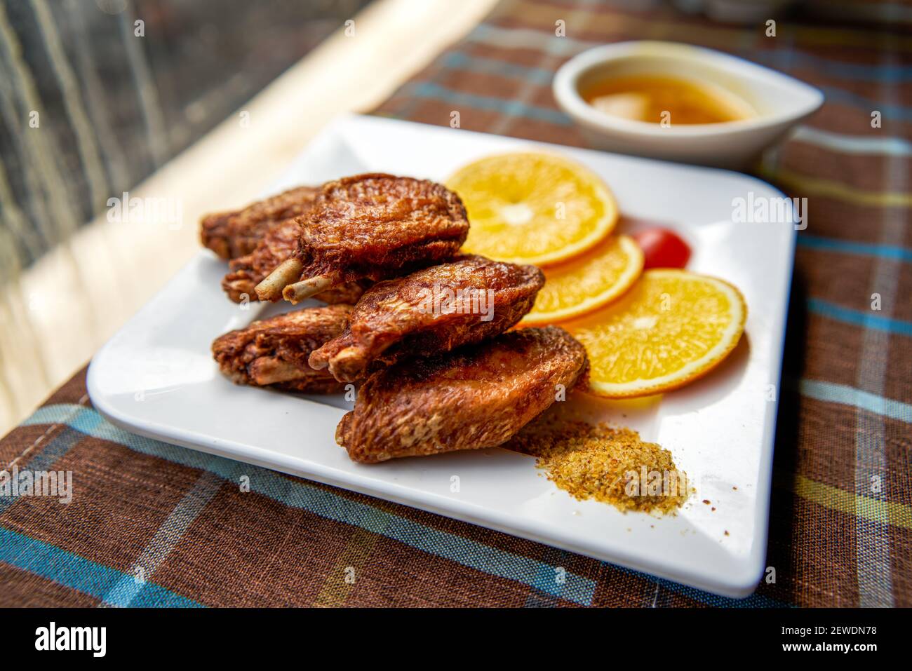 A close-up of a golden tempting deep-fried chicken wings Stock Photo ...
