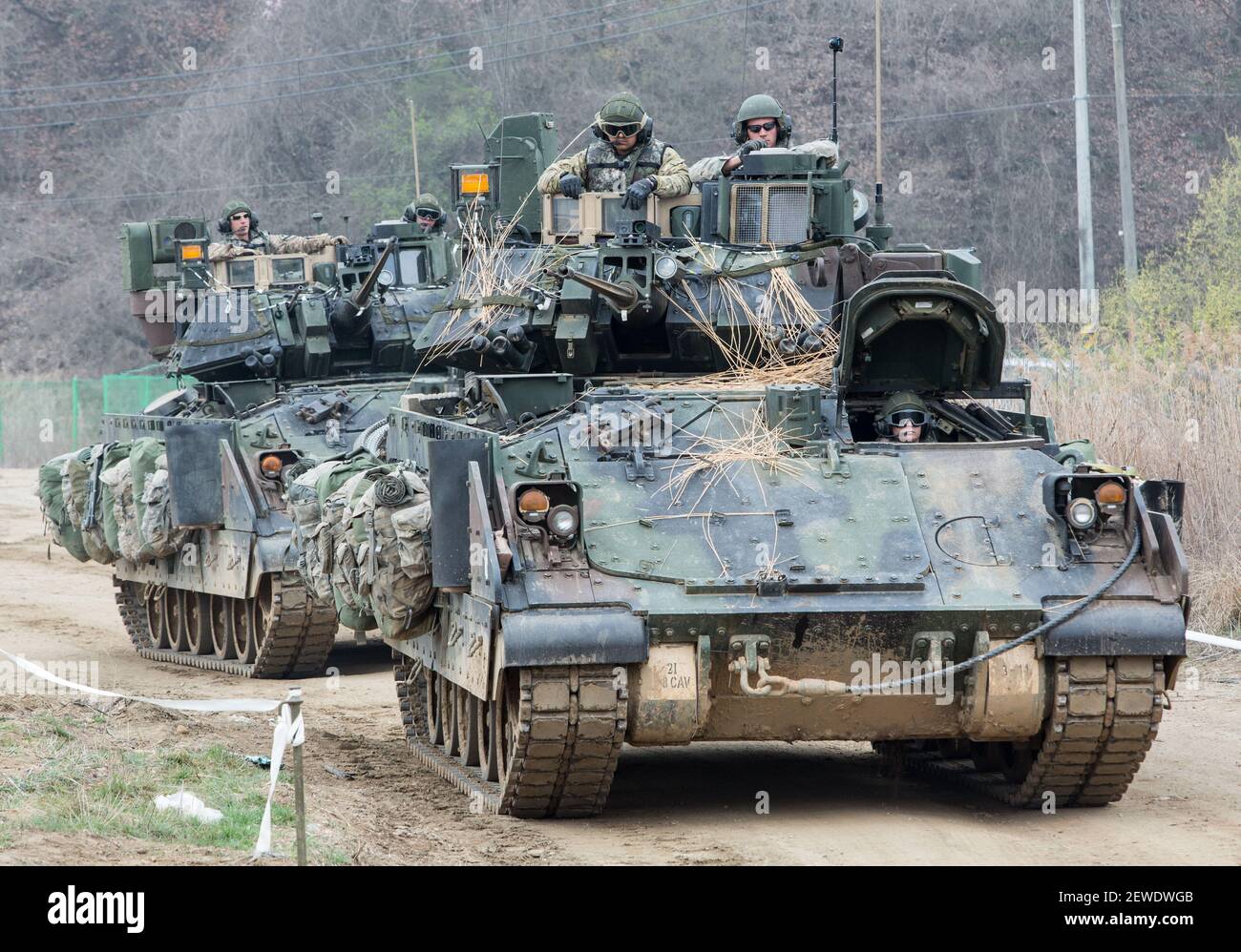 U.S. Army soldiers and M1A1 Bradley infantry fighting vehicle (IFV ...