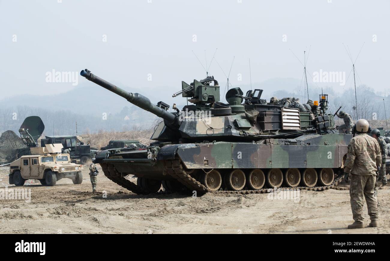 U.S. Army soldiers and M1A1 Bradley infantry fighting vehicle (IFV ...