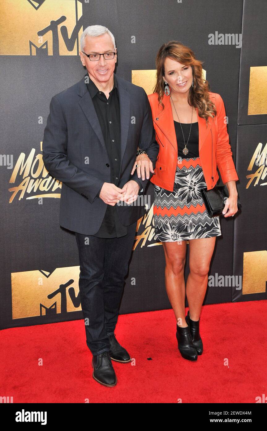 Dr. Drew Pinsky and Susan Pinksy attend the 2016 MTV Movie Awards at ...