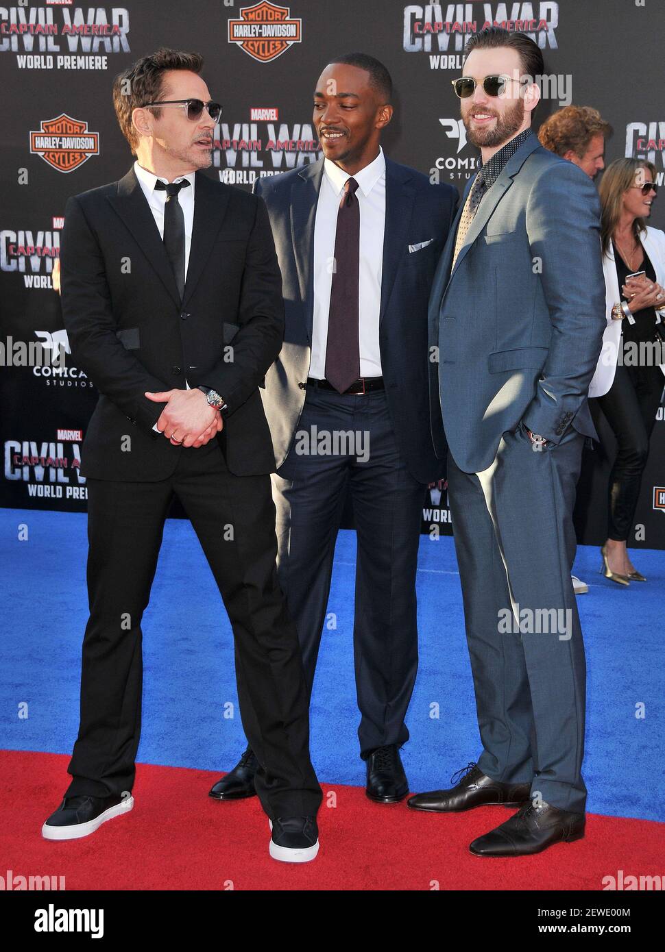 (L-R) Robert Downey Jr, Anthony Mackie and Chris Evans arrives at ...