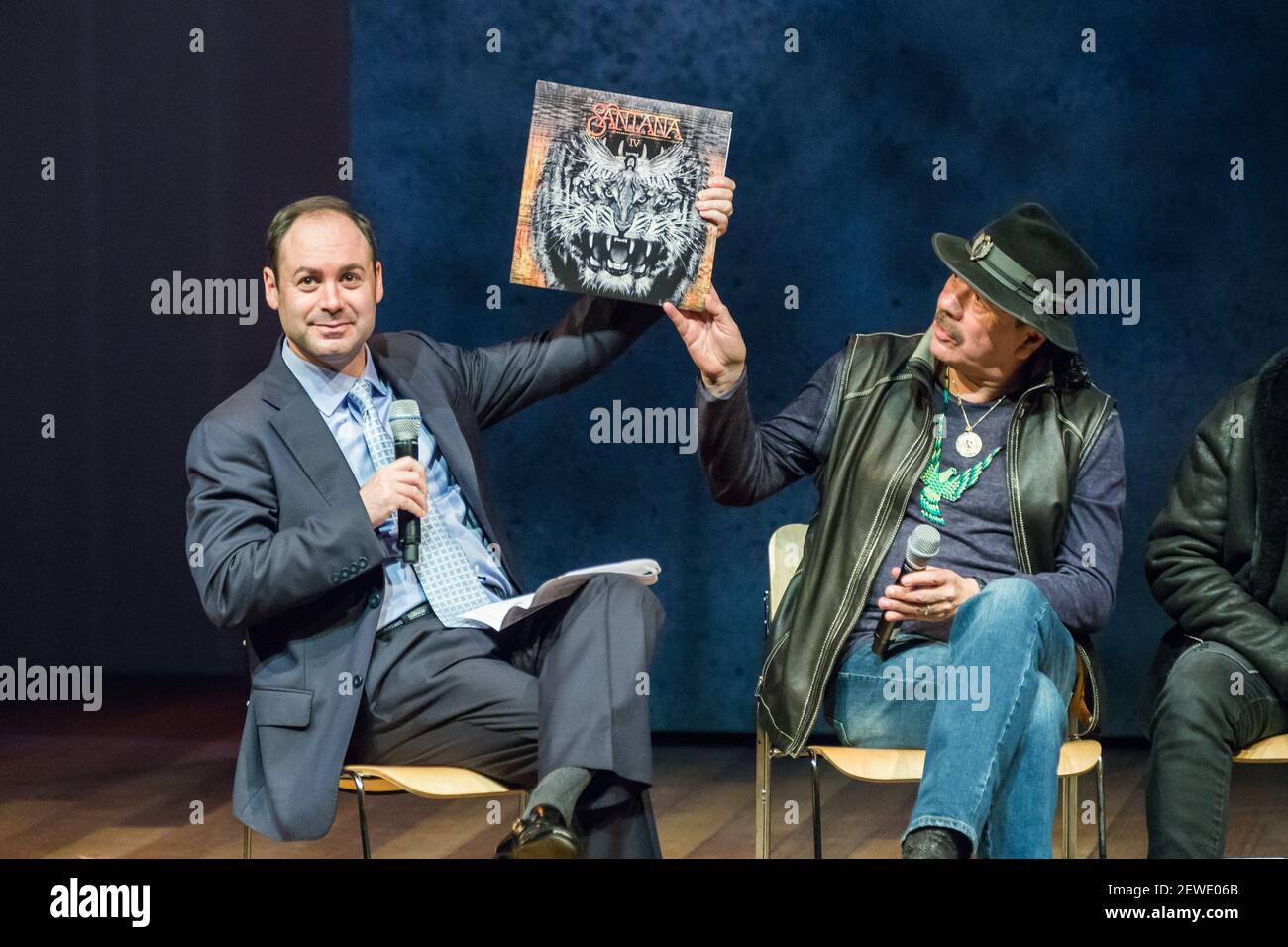 Moderator Joe Pascal and Carlos Santana attend a press conference at ...