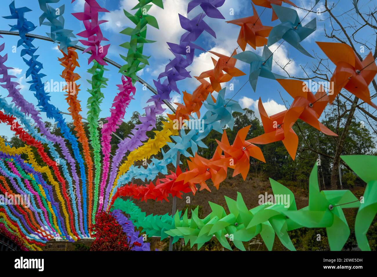 Colorful plastic toy small windmill close-up Stock Photo - Alamy