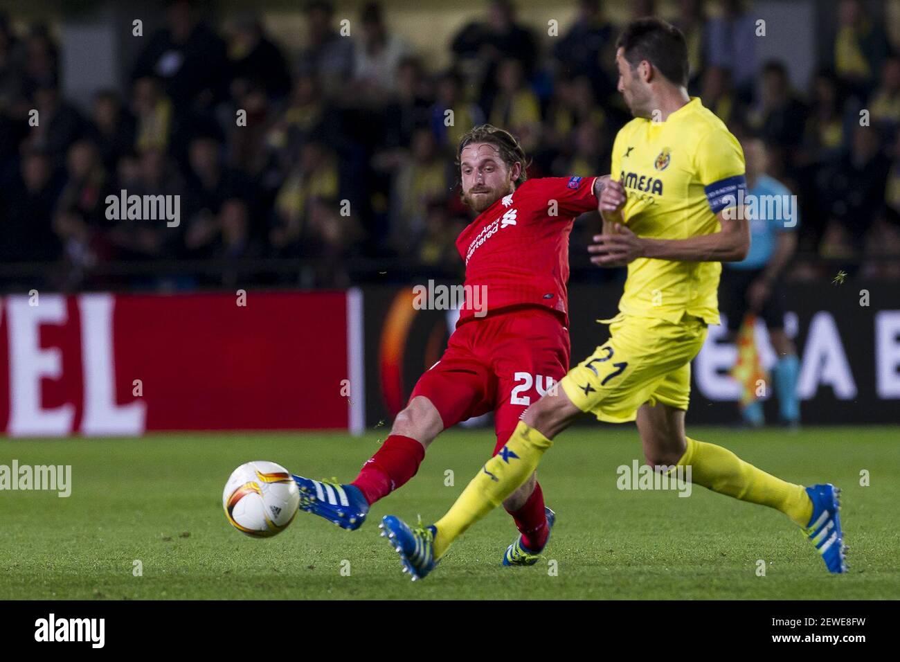 24 Midfield of Liverpool FC Joe Allen (L) and 21 Bruno of Villarreal CF ...