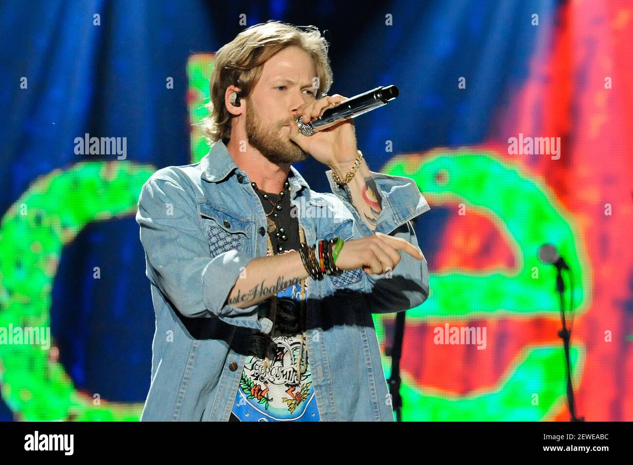 Brian Kelley with Florida Georgia Line performs on stage during the 2016 iHeartCountry Festival ...