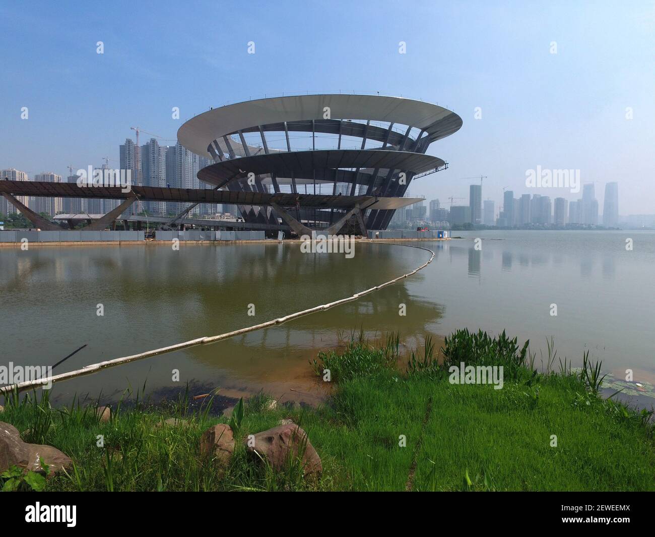 The spiral sightseeing platform is seen at the Meixi lake in Changsha ...