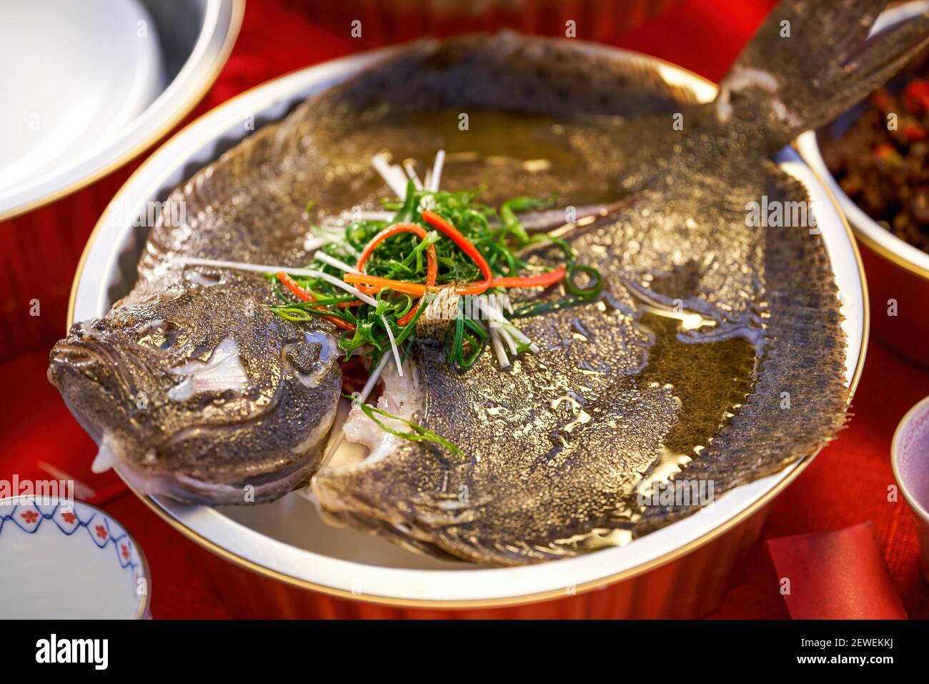 A delicious Chinese dish, steamed turbot Stock Photo - Alamy