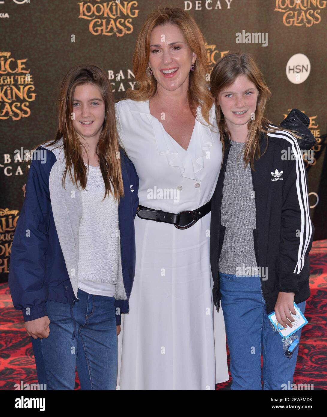 Peri Gilpin and Daughters arrives at the "Alice Through The Looking ...
