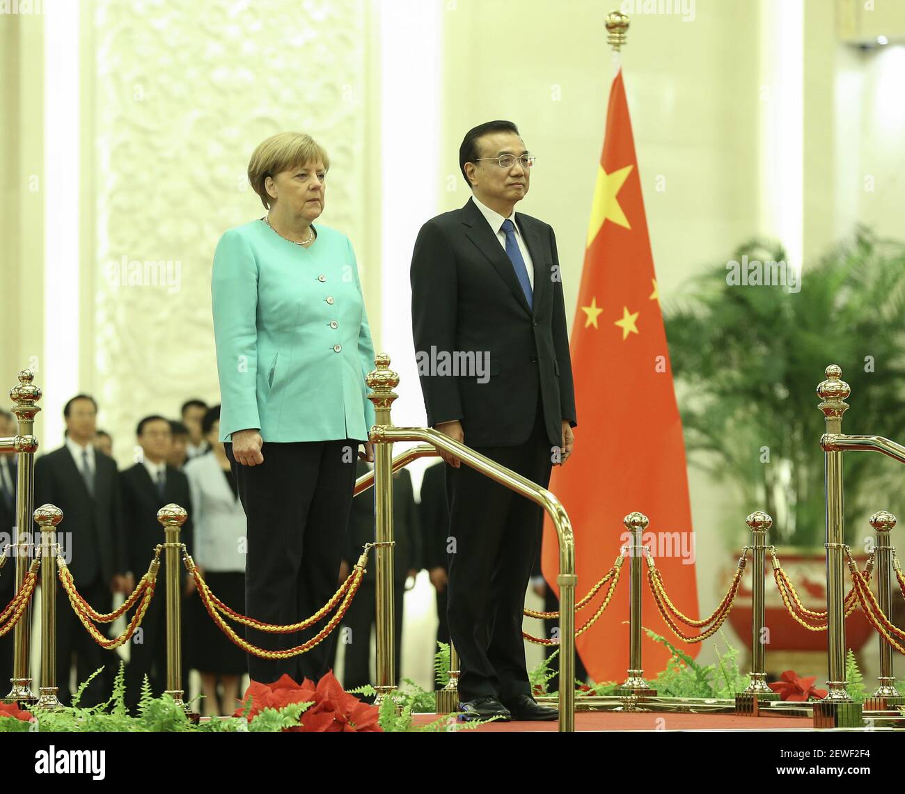 Chinese Premier Li Keqiang (R) holds a welcoming ceremony for German ...