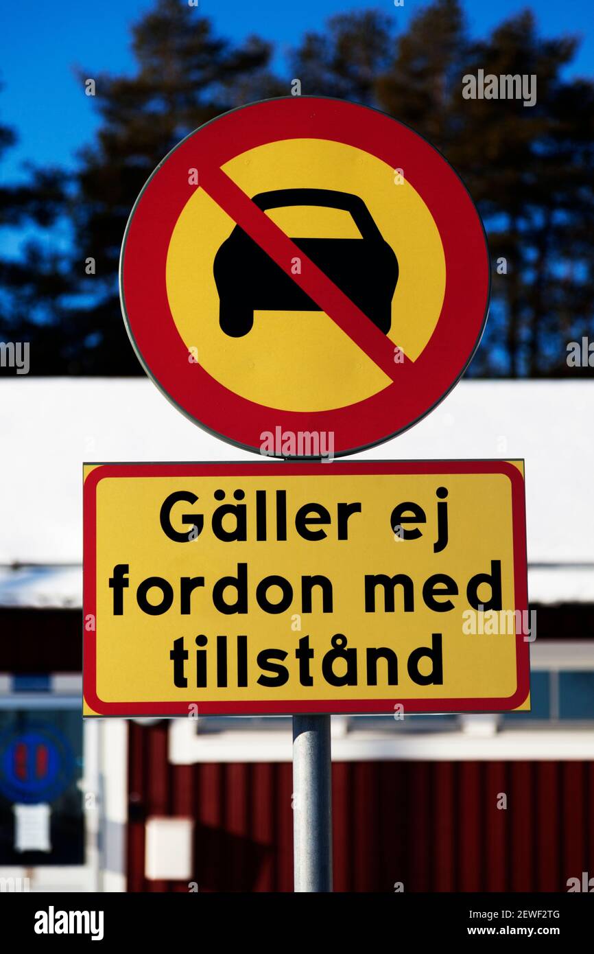 traffic sign with the text does not apply to vehicles with a permit ...