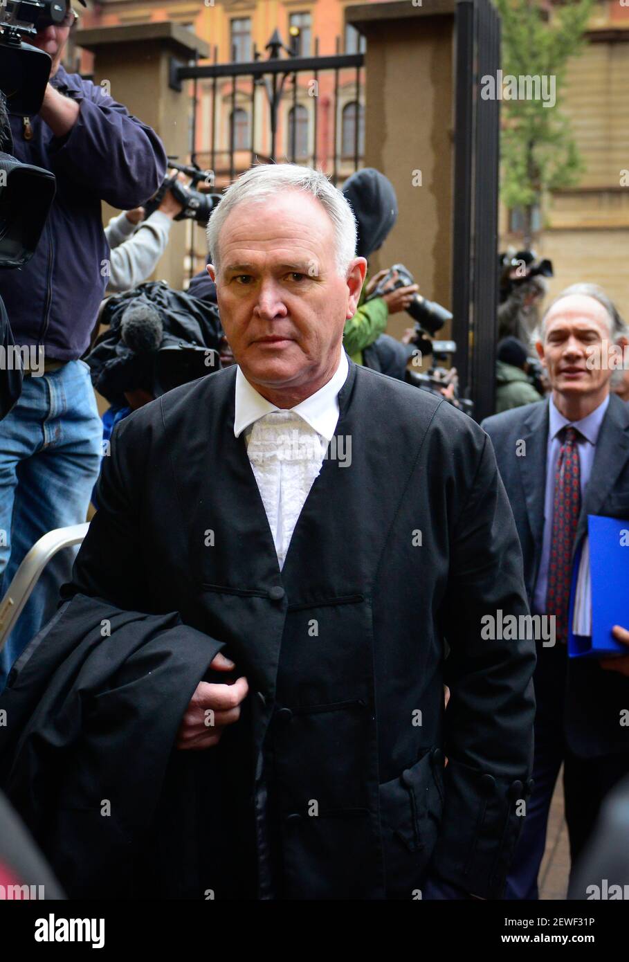 Oscar Pistorius's main defense lawyer Barry Roux arrives at the North ...