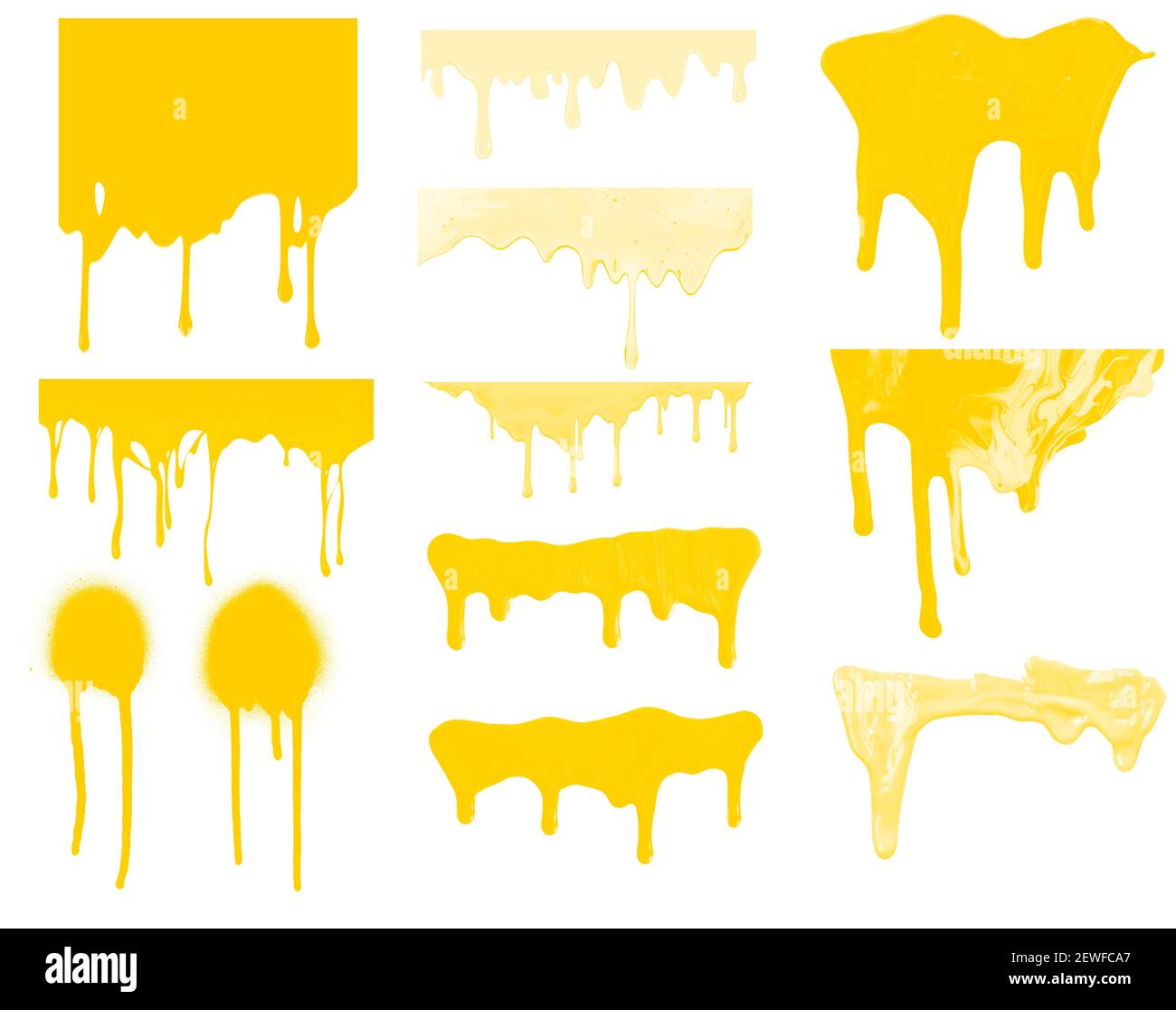 Yellow paint stains and spray brushes isolated on white background for ...