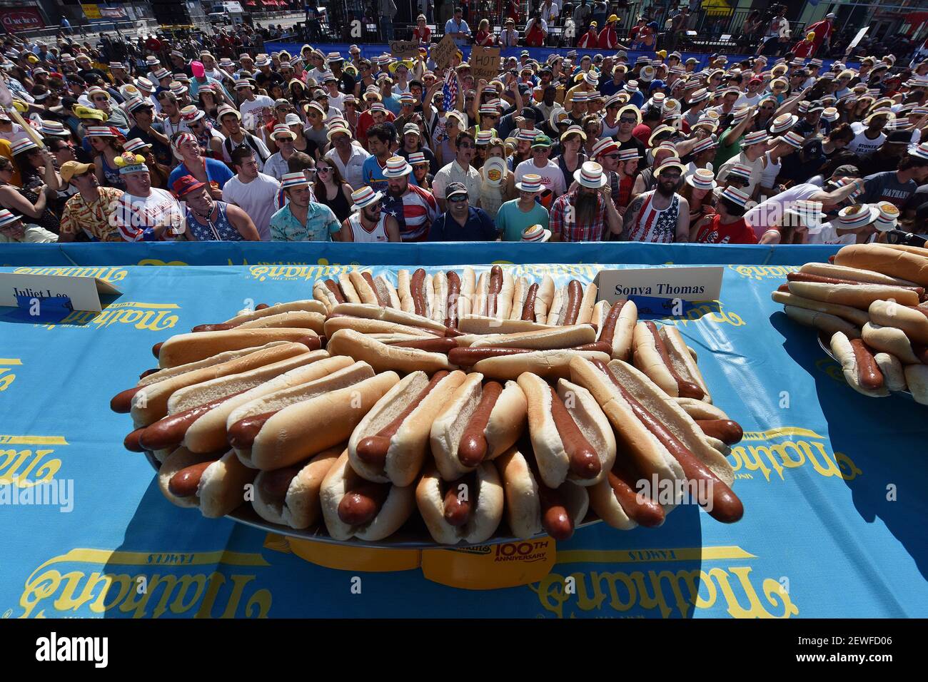 A tray of hot dogs that competitors will eat is on display before the ...