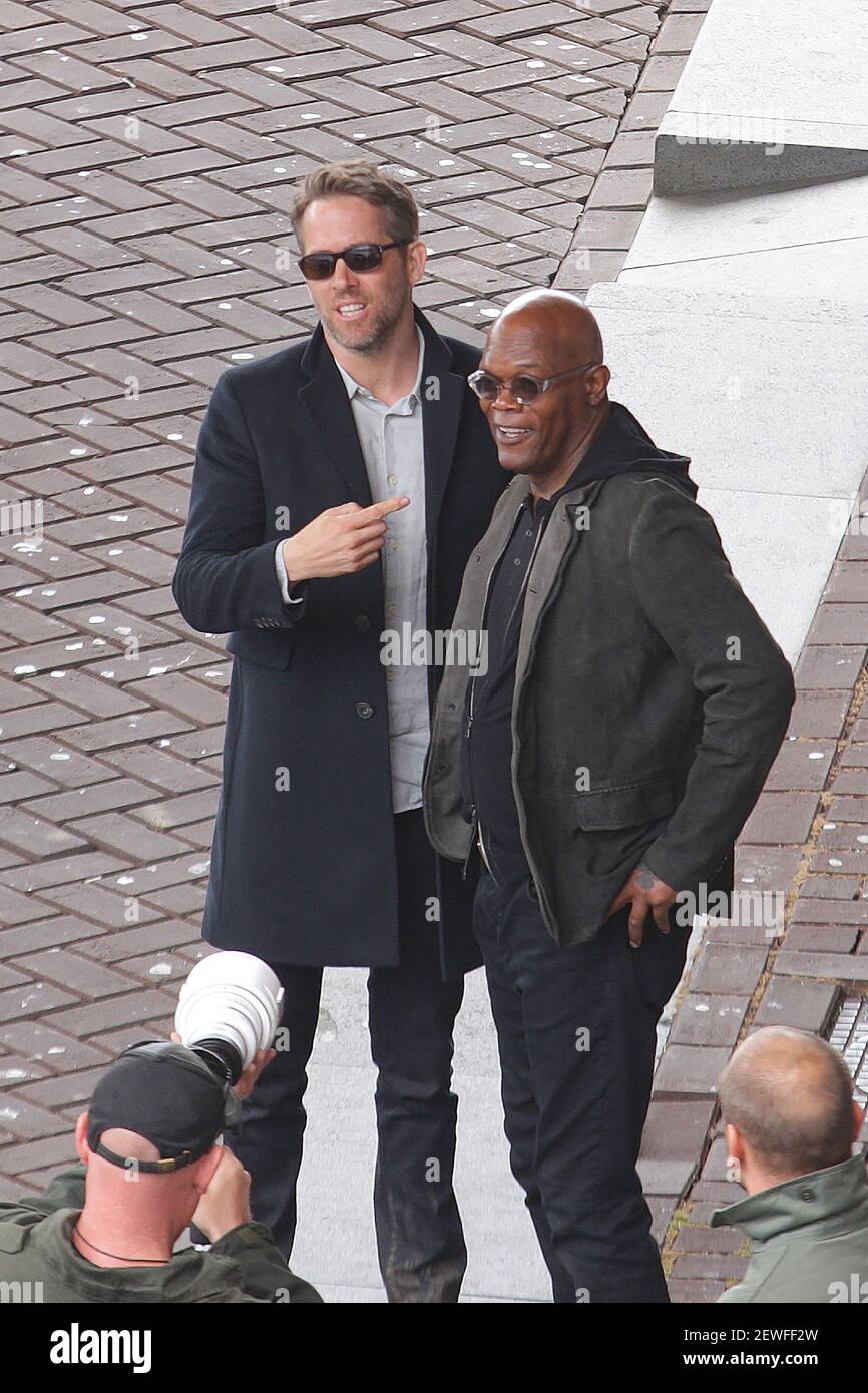 Canadian actor Ryan Reynolds (L) and US actor Samuel L. Jackson (R) in ...