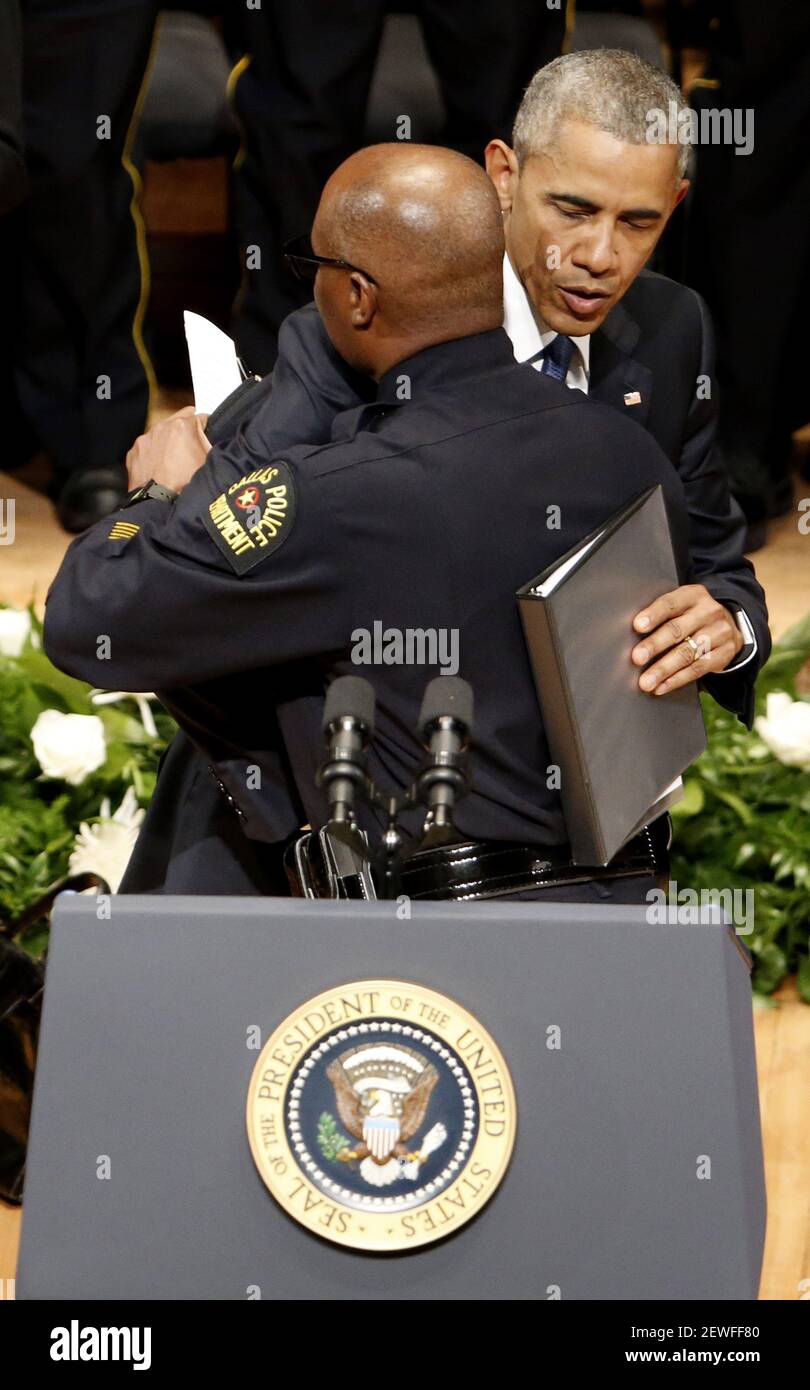 President Barack Obama hugs Dallas Police Chief David Brown during a ...