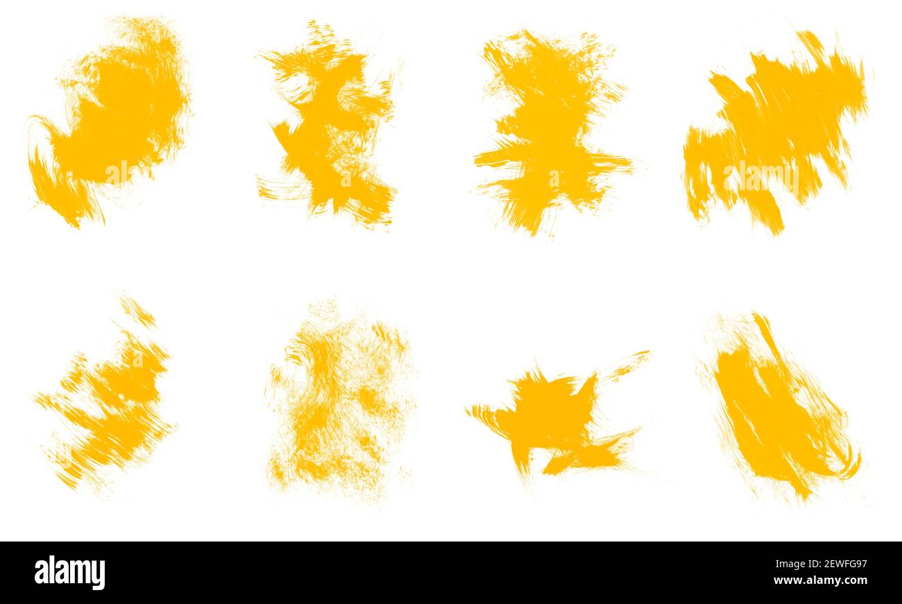 Yellow paint smear brushes for painting Stock Photo - Alamy