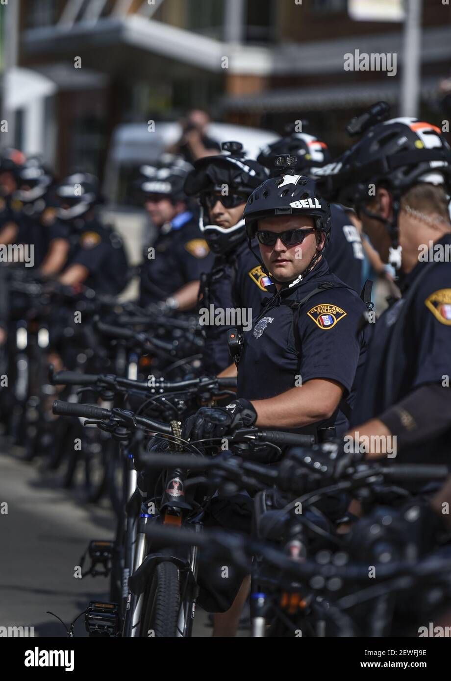 Cleveland police officers patrol Euclid Street ahead of the start of ...