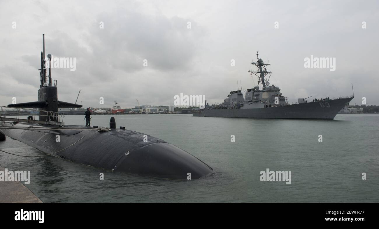 The Los Angeles-class attack submarine USS Buffalo (SSN 715) and the ...