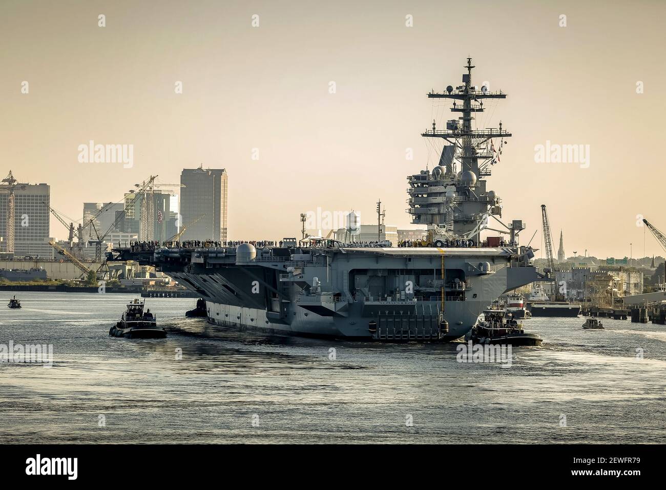 The aircraft carrier USS George H.W. Bush (CVN 77) departs Norfolk ...