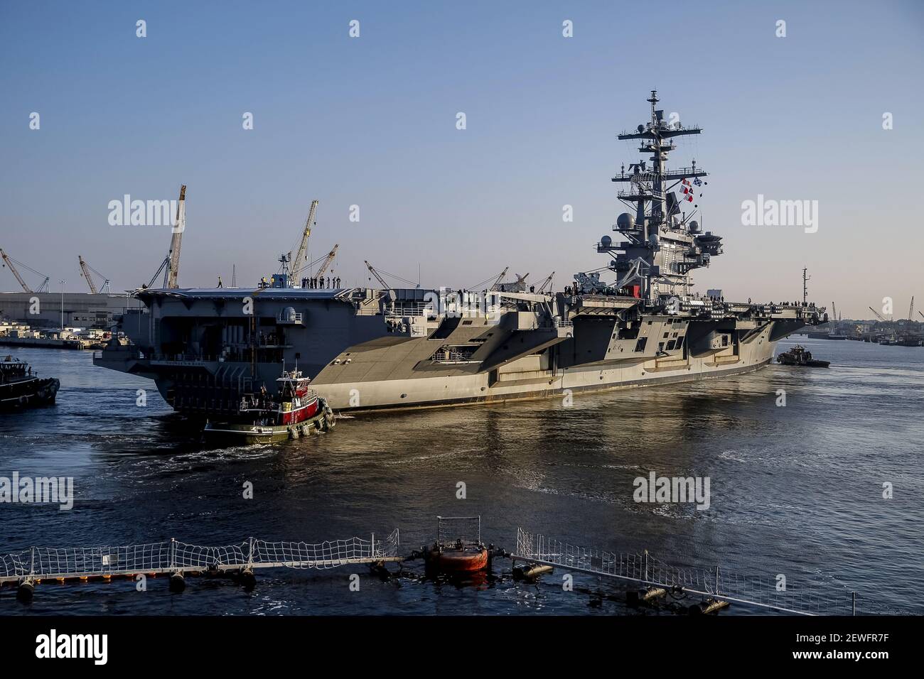 The aircraft carrier USS George H.W. Bush (CVN 77) departs Norfolk ...
