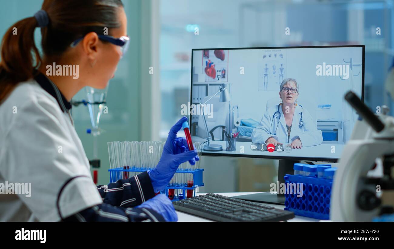 Helping scientist hi-res stock photography and images - Alamy