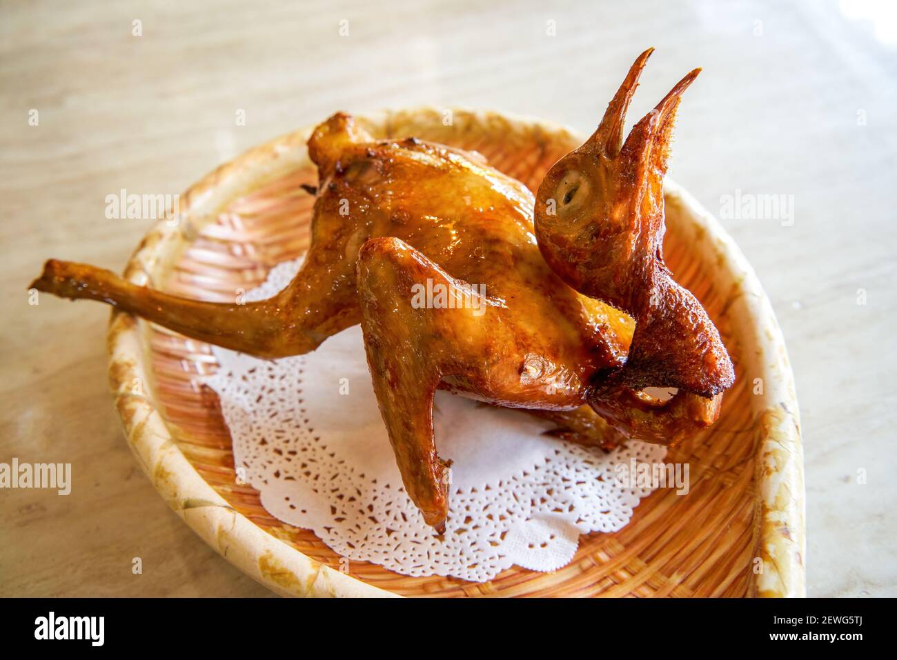 A classic Cantonese dish, braised pigeon, fried pigeon Stock Photo - Alamy