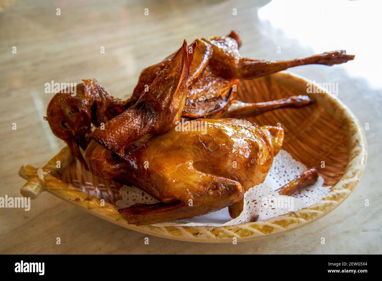 A classic Cantonese dish, braised pigeon, fried pigeon Stock Photo - Alamy