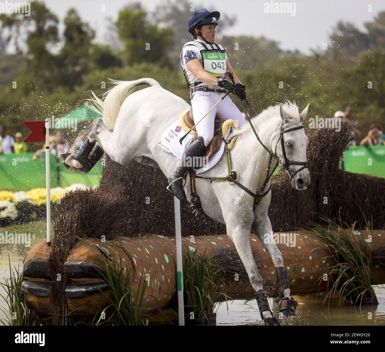 Great Britain's Pippa Funnell completes a water jump on Billy the Biz ...