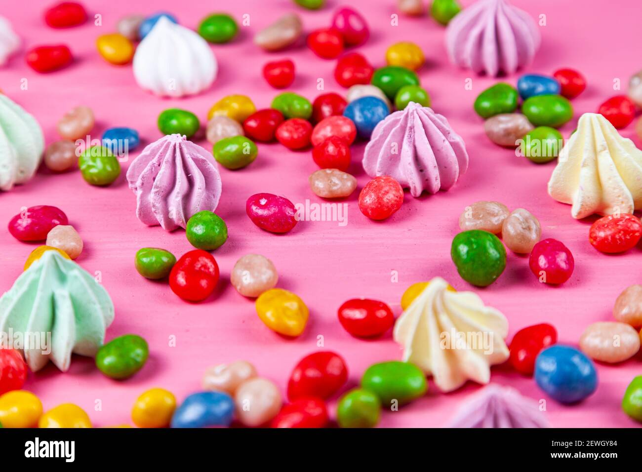 Sweets on a pink table. Valentine's day. Heart shaped sweets Stock ...