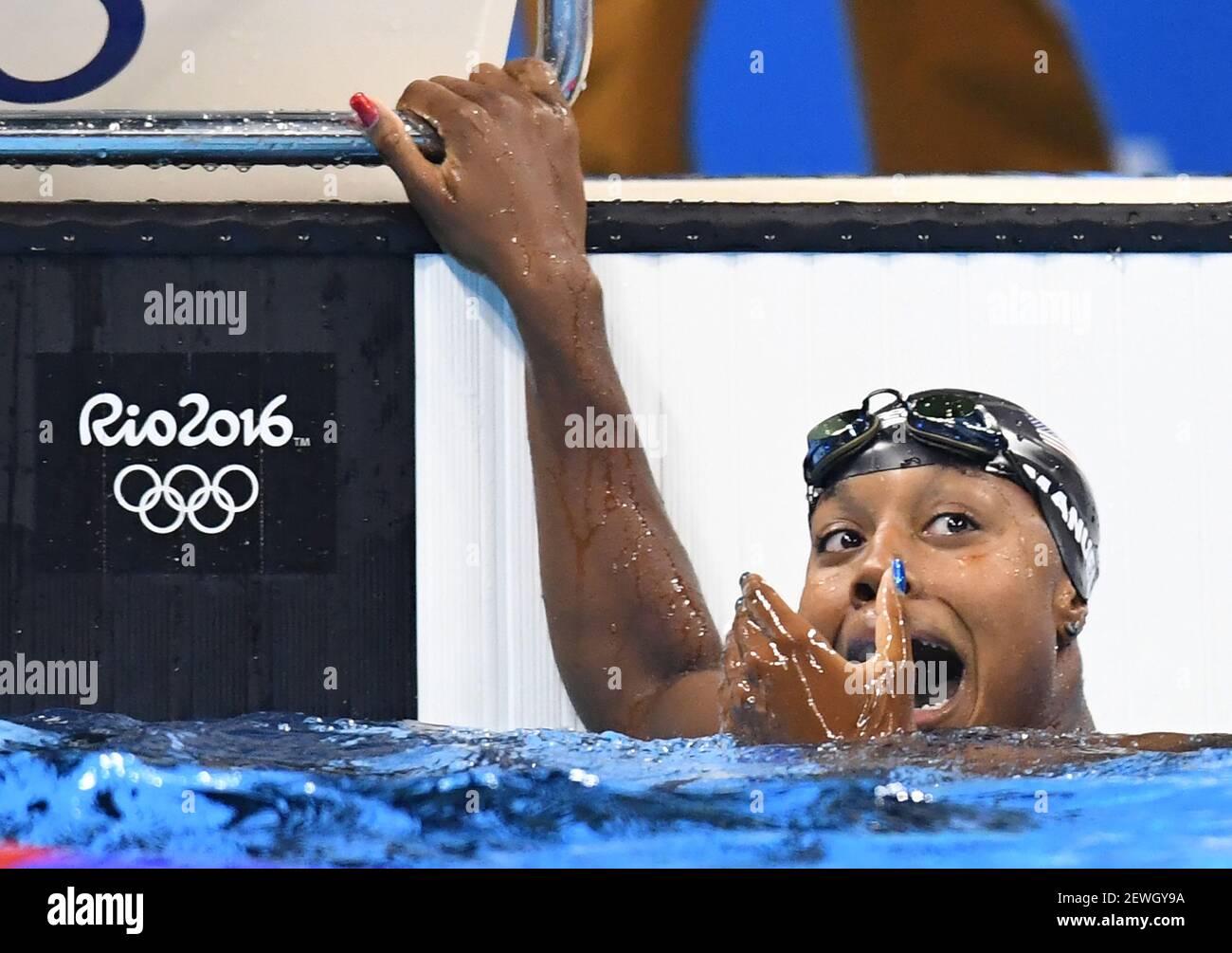 U.S. swimmer Simone Manuel reacts after seeing her first-place finish ...