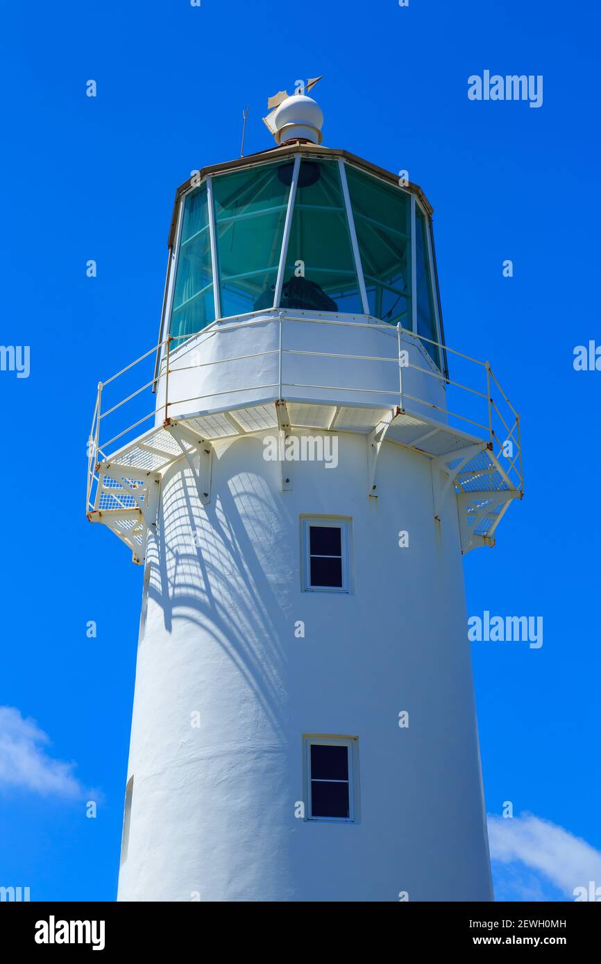 The top of an old lighthouse against a blue sky. Photographed at Cape ...