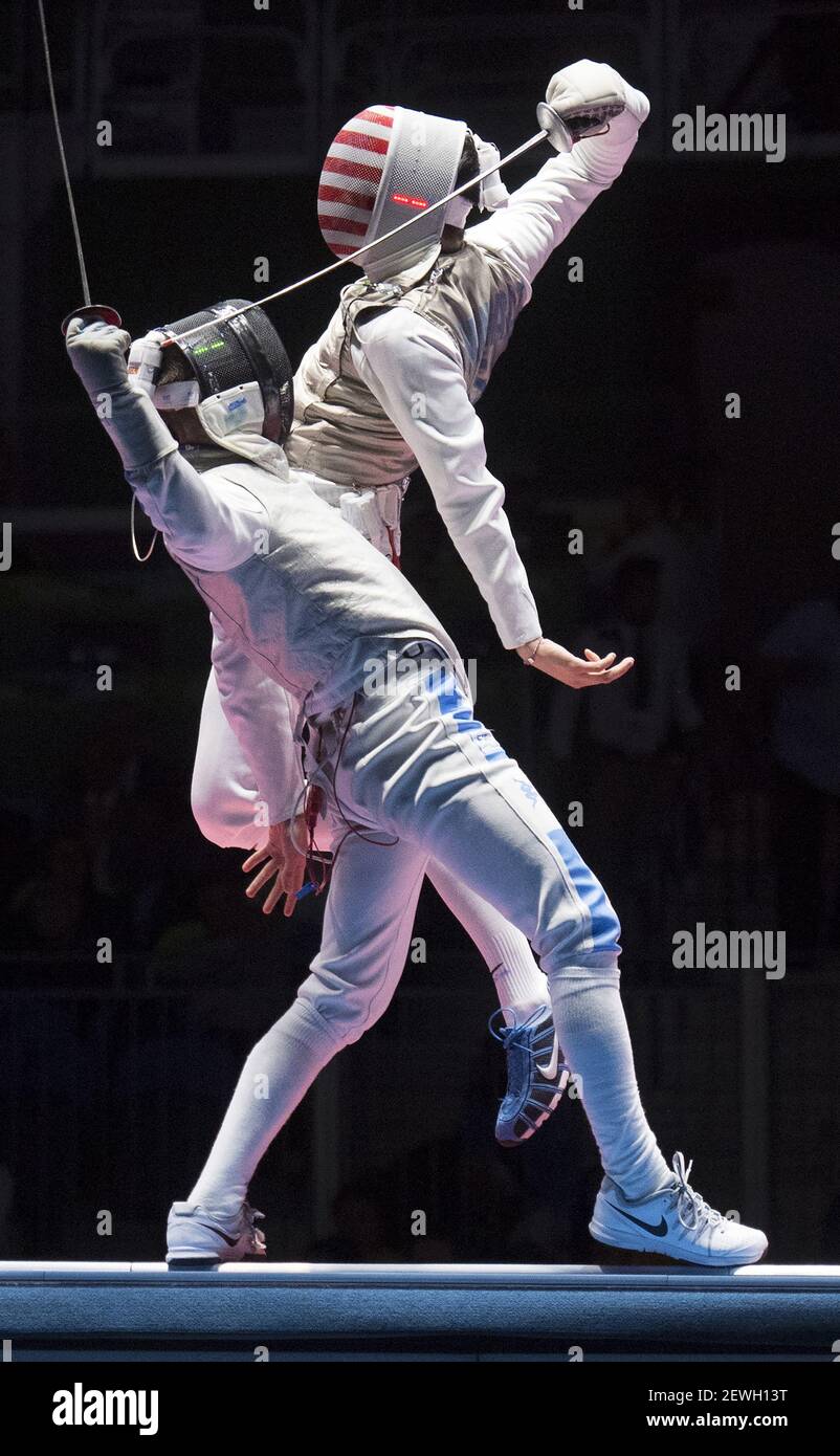 U.S. fencer Gerek Meinhardt, right, takes on Italy's Daniele Garozzo in ...