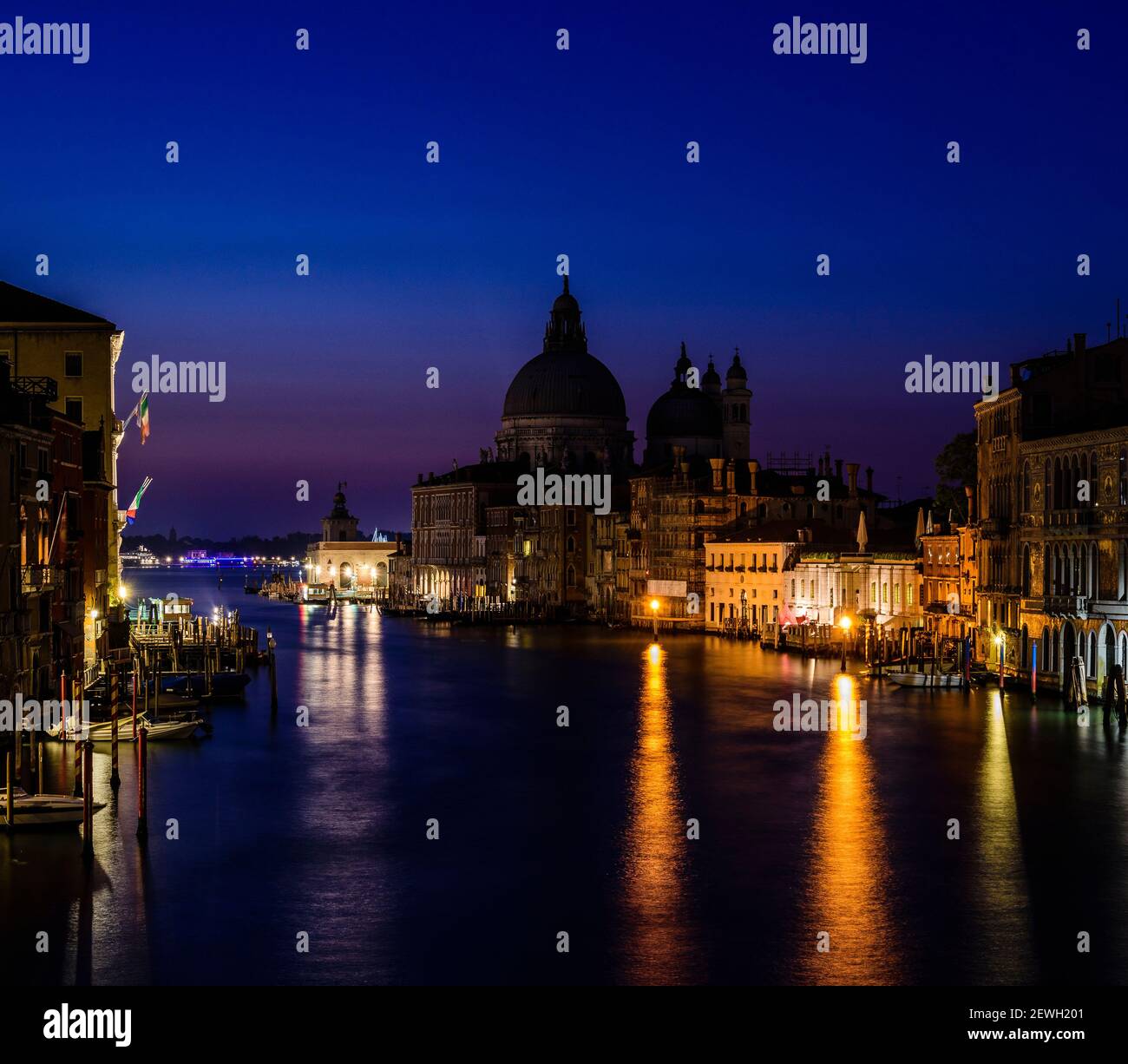 The Grand Canal in Venice, at night, historic buildings in silhouette ...